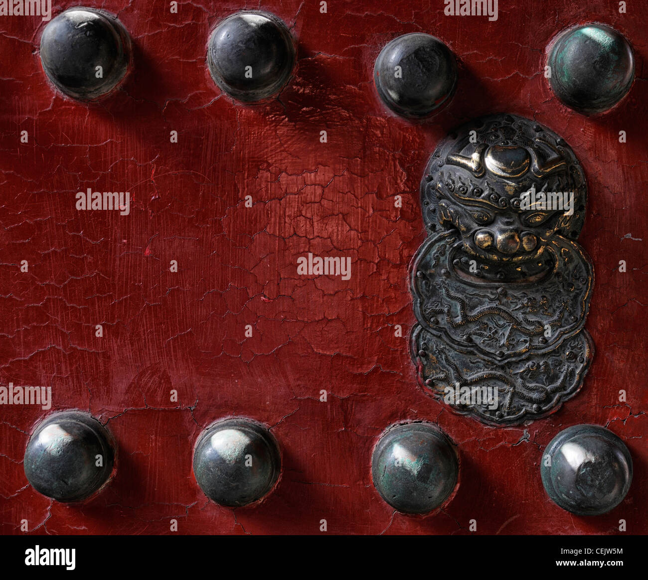 Detail detailed heavy bronze stud studded red door gate entrance ...