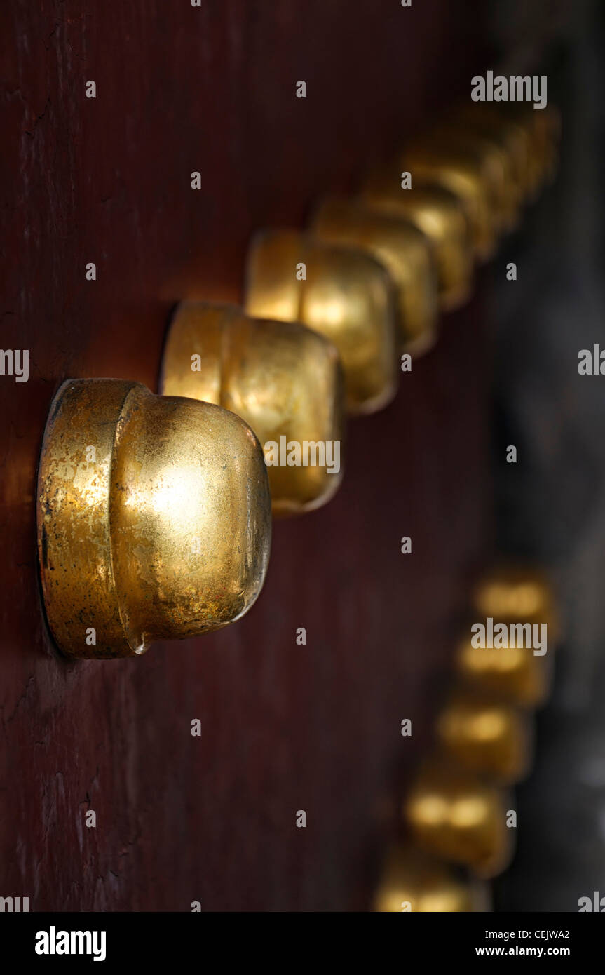 Detail detailed heavy bronze stud studded red door gate entrance ...