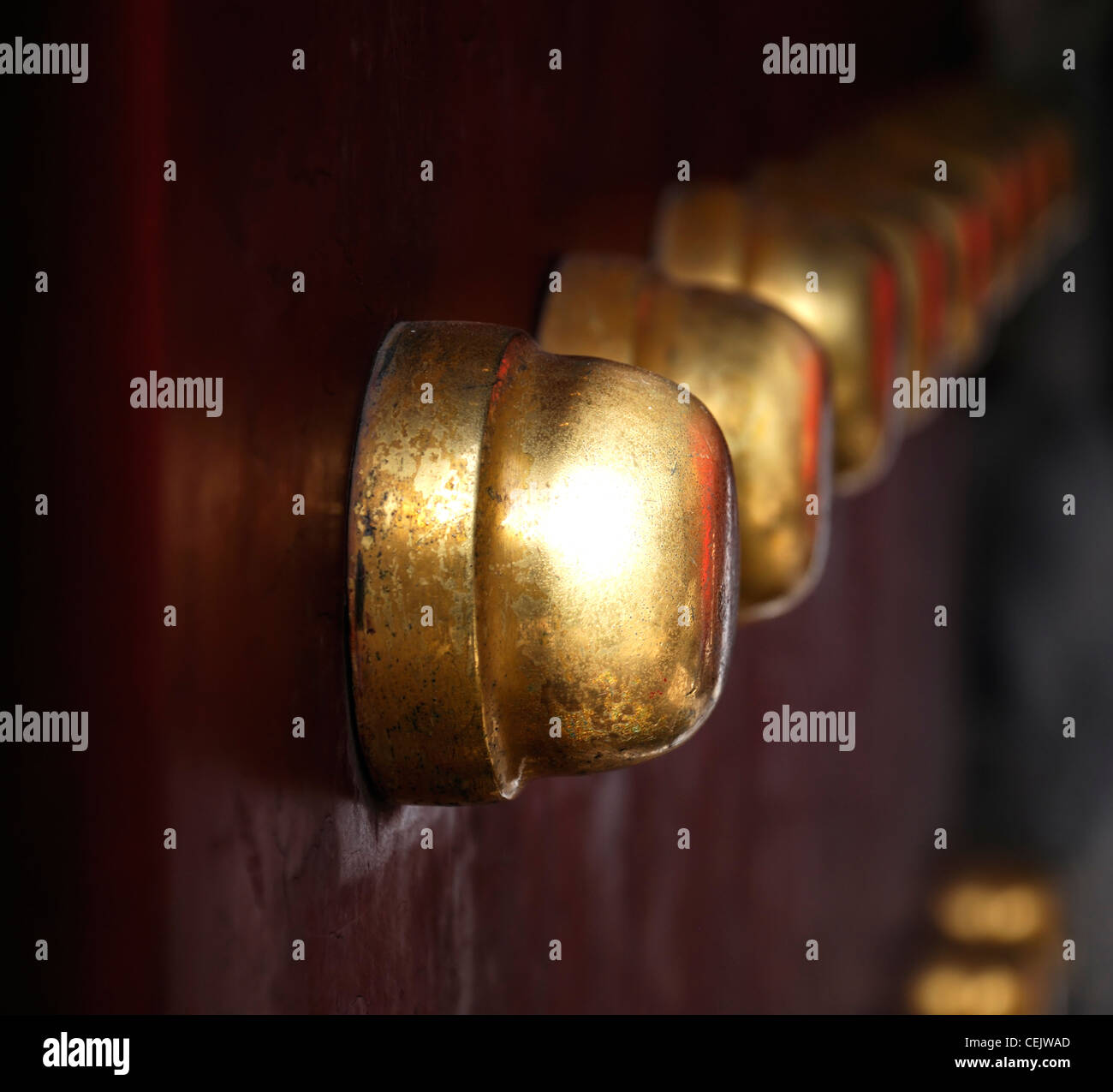 Detail detailed heavy bronze stud studded red door gate entrance ...