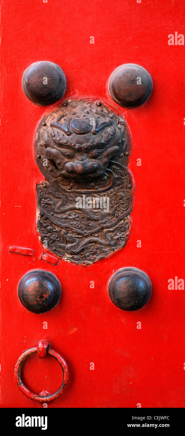 Detail detailed heavy bronze stud studded red door gate entrance ...