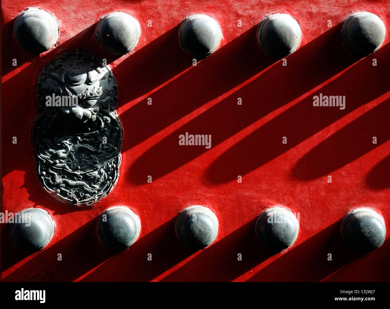 Detail detailed heavy bronze stud studded red door gate entrance ...