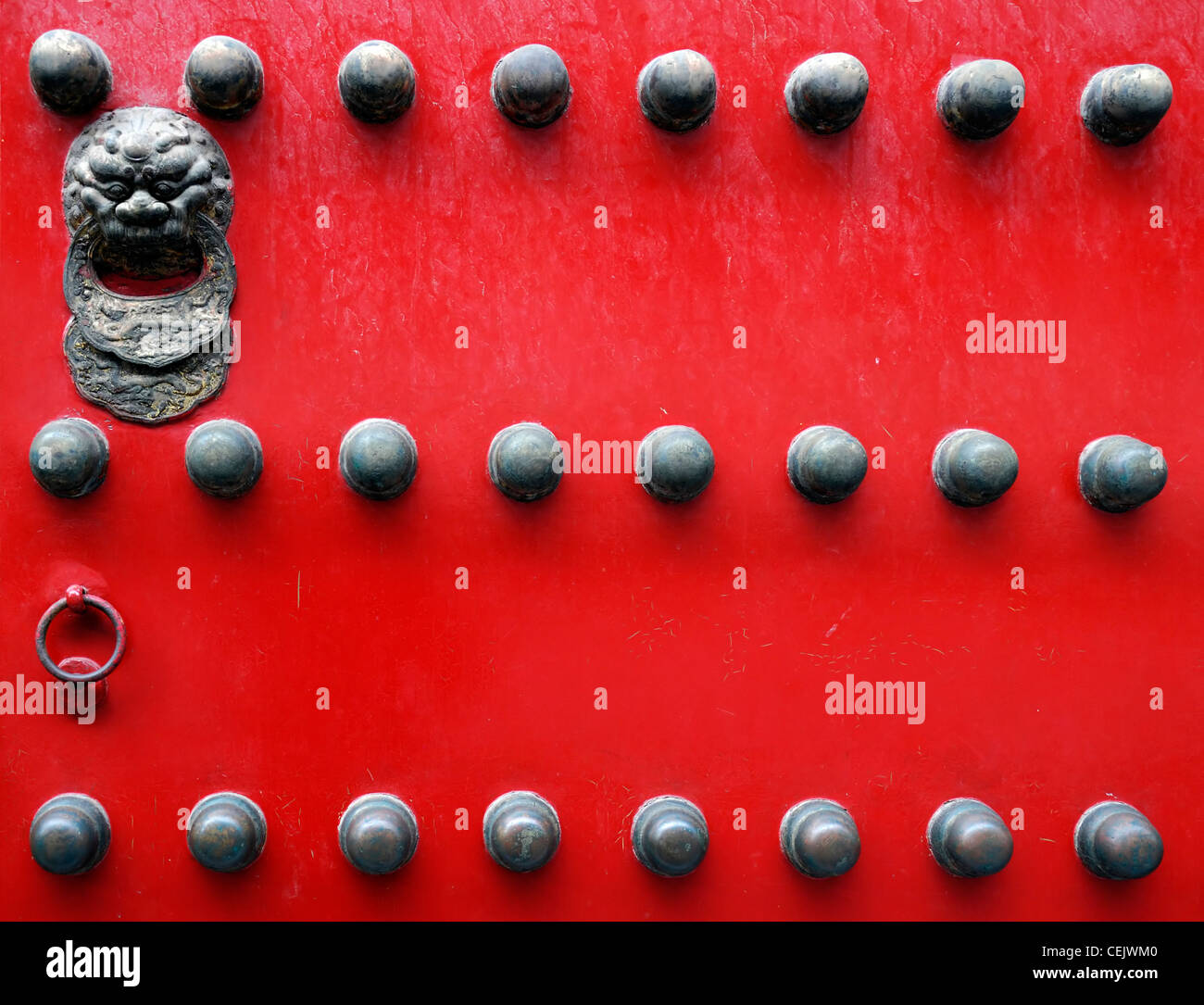 Detail detailed heavy bronze stud studded red door gate entrance ...