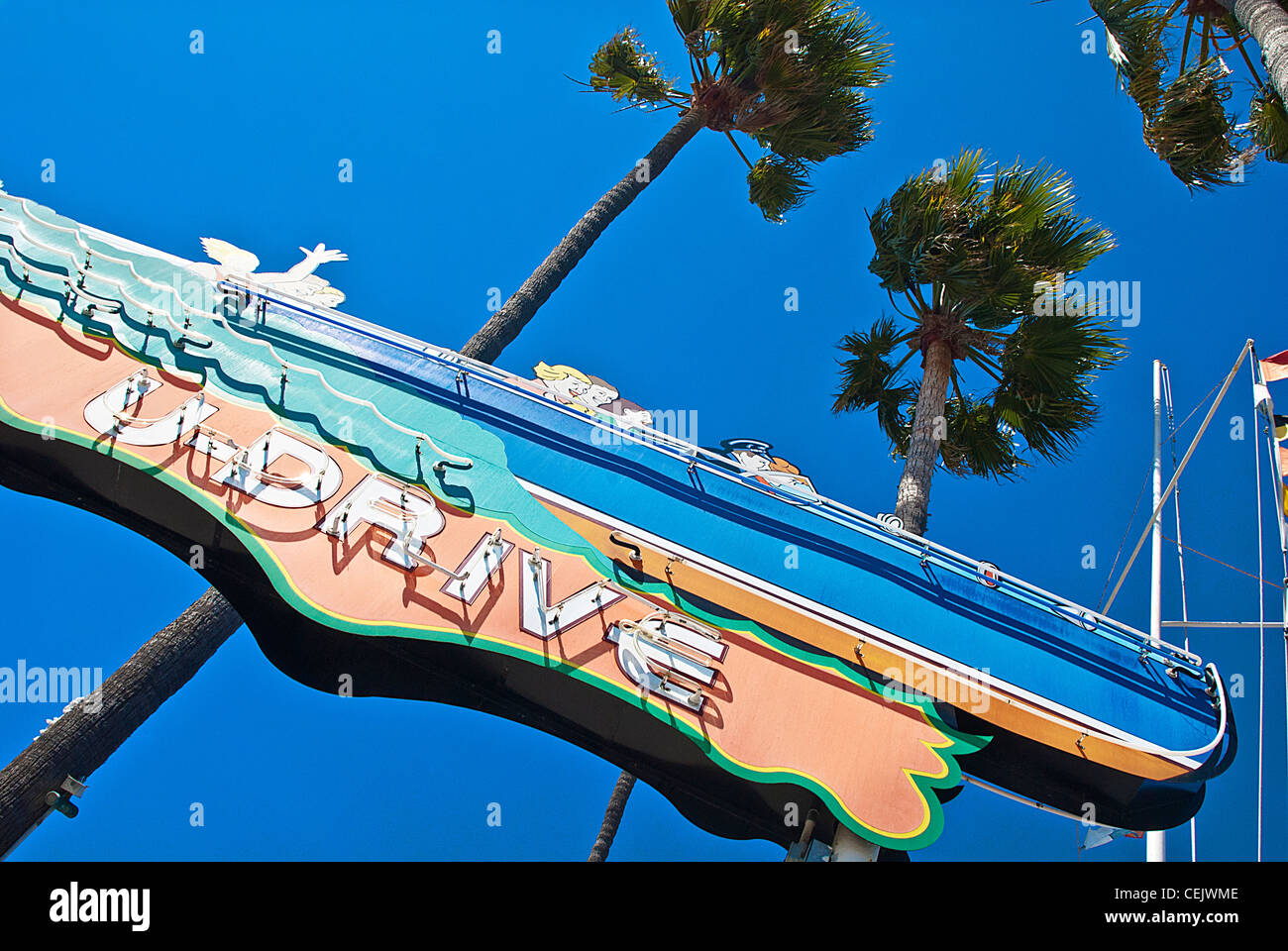 looking up u-drive sign with palm trees behind. newport harbor balboa ...