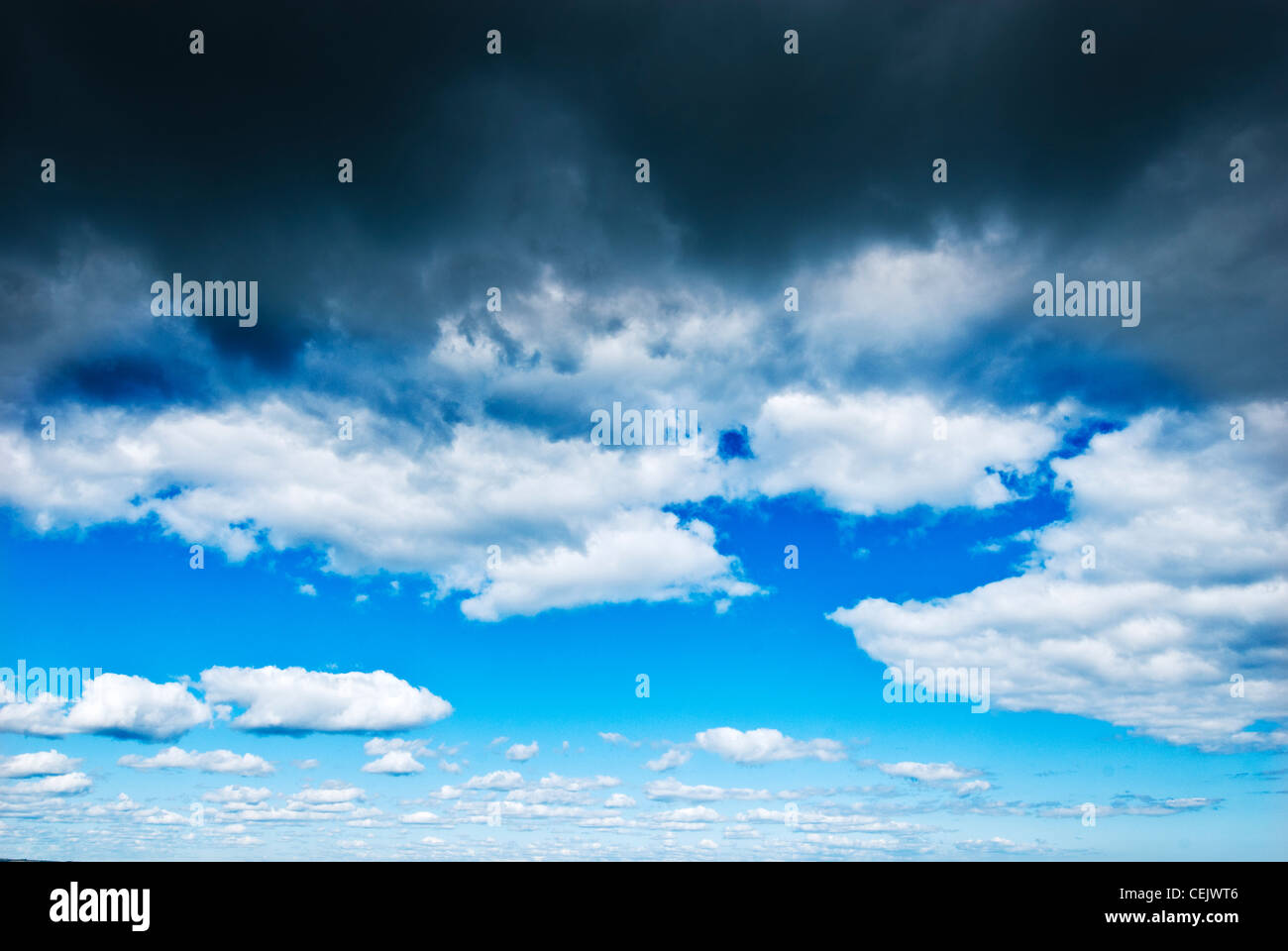 layers of moody, dramatic clouds going into distance Stock Photo - Alamy