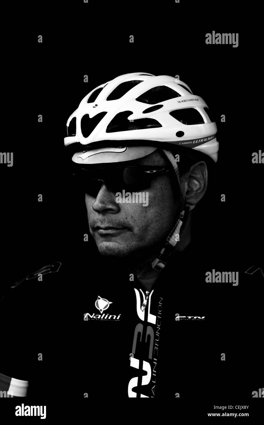 Cyclist Jim Anderson poses for a portrait after racing in a twenty-five ...