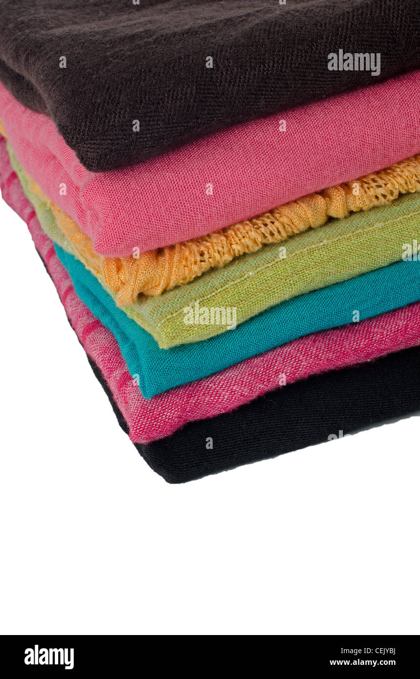 Pile of colorful scarves over white background Stock Photo - Alamy