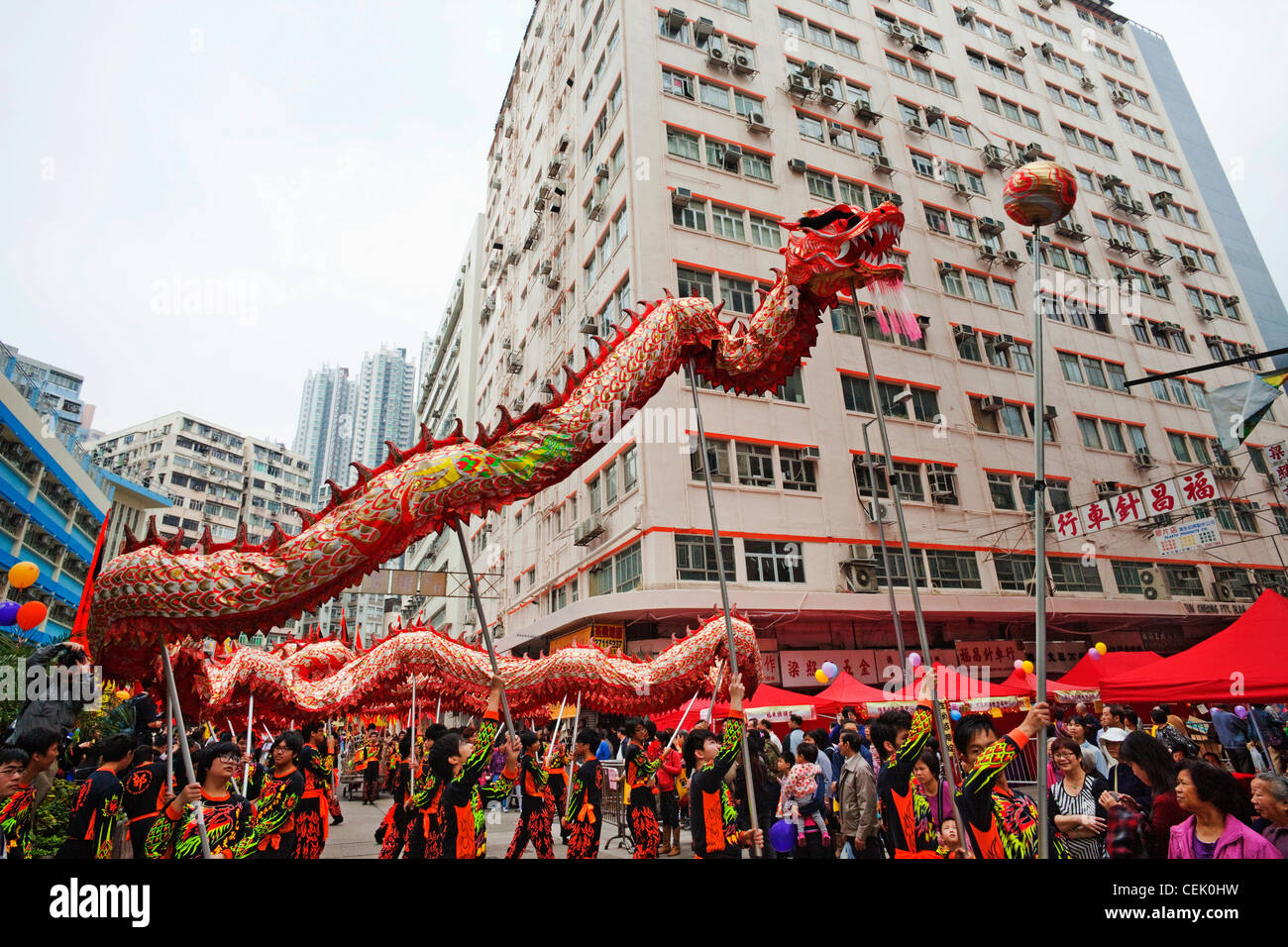 Traditional Chinese Dragon dance being performed on the street, Tai Kok ...