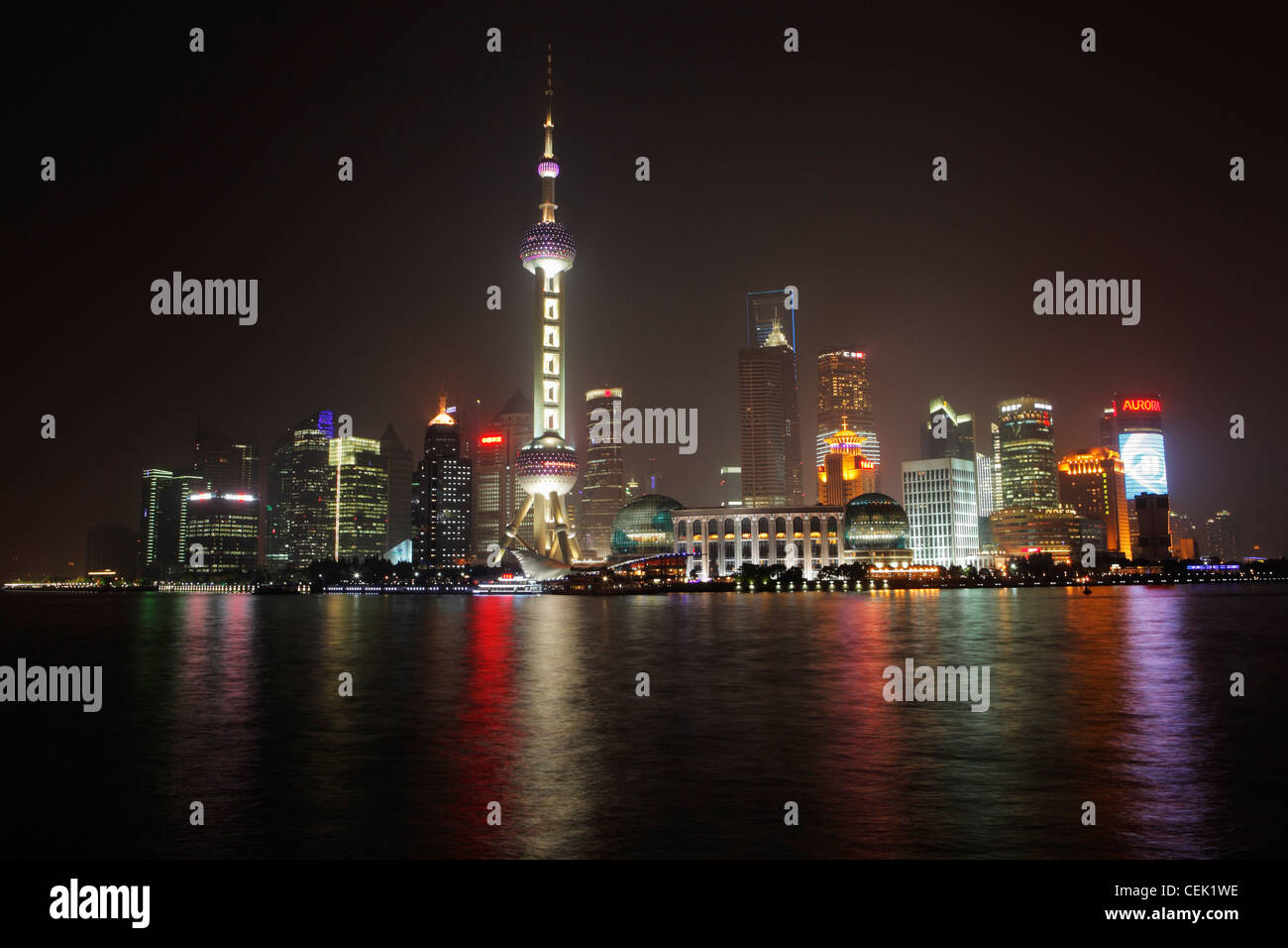 Shanghai City skyline at night with lights reflected on the water Stock ...