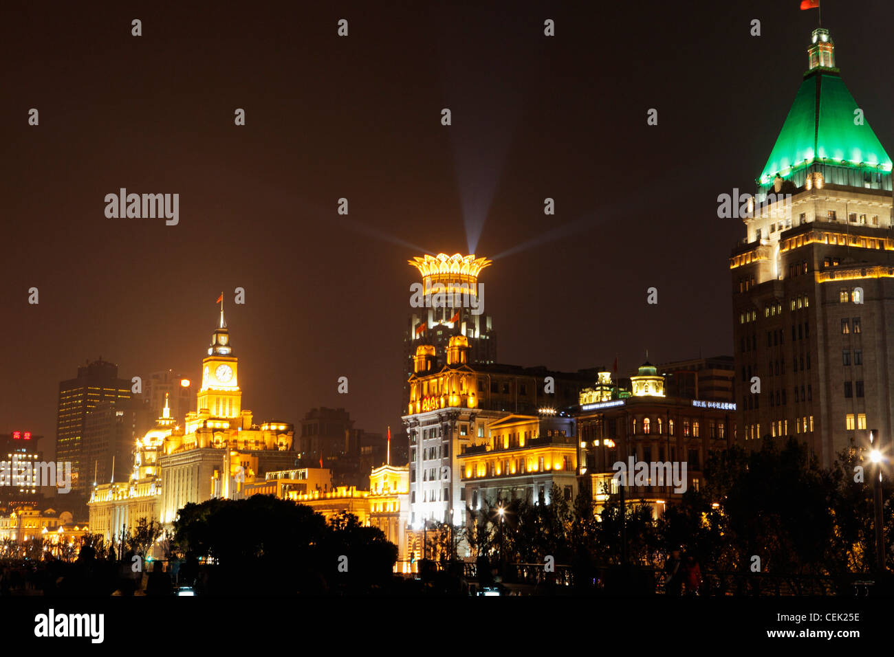 The buildings of the Bund at night. Peace Hotel in foreground, Shanghai ...