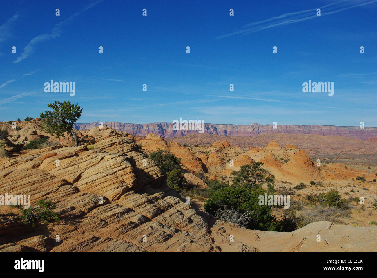 Multiple rock formations with Vermillion Cliffs, Arizona Stock Photo ...