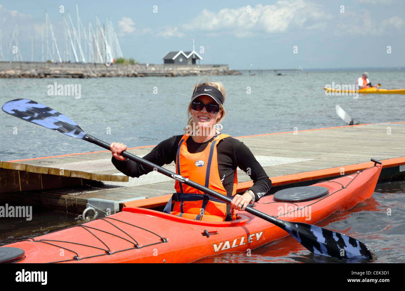 First kayak strokes away from the pontoon bridge at a weekend kayak ...
