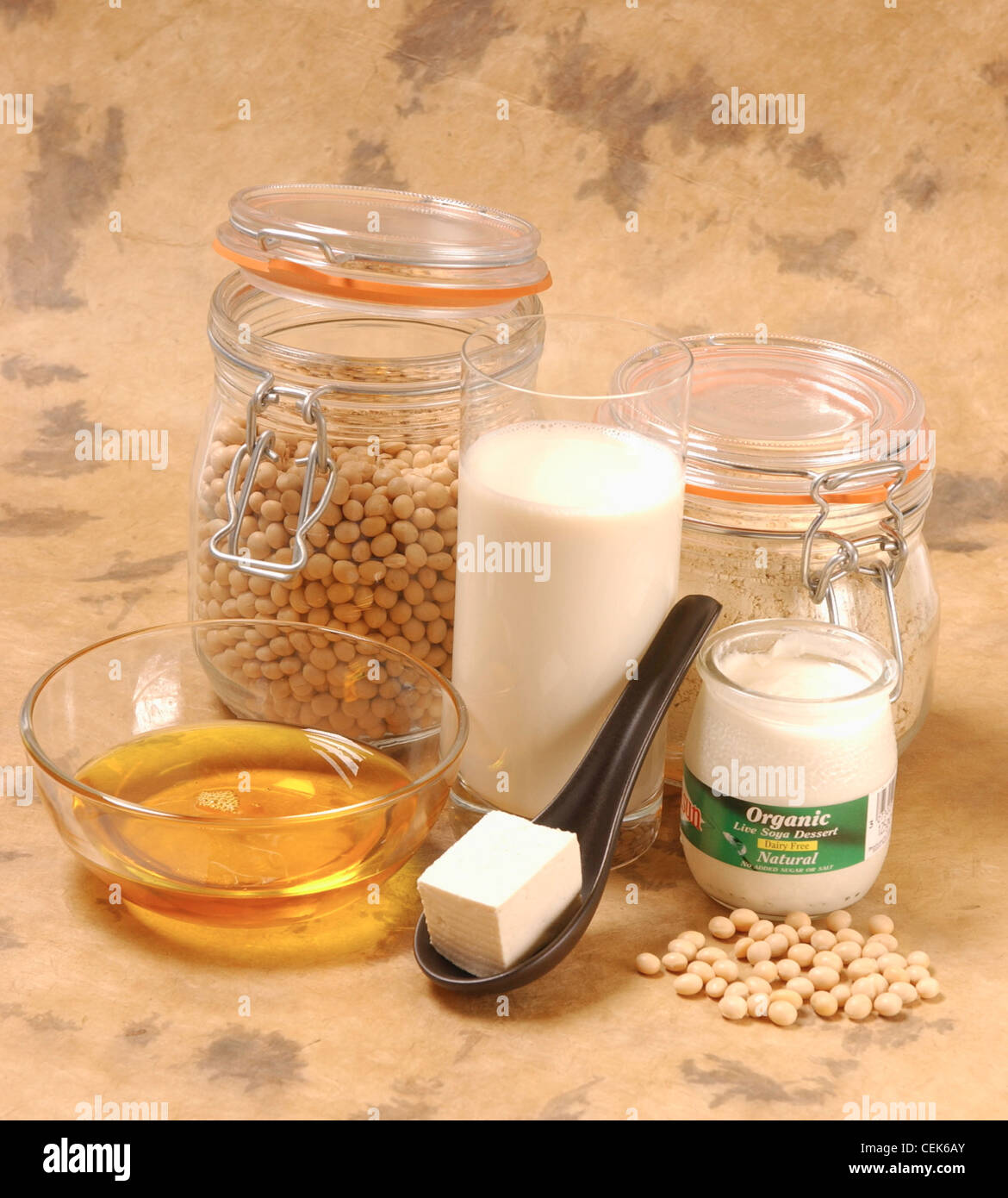 Selection of vegetarian food: Jar of soya beans, pot of soya dessert ...