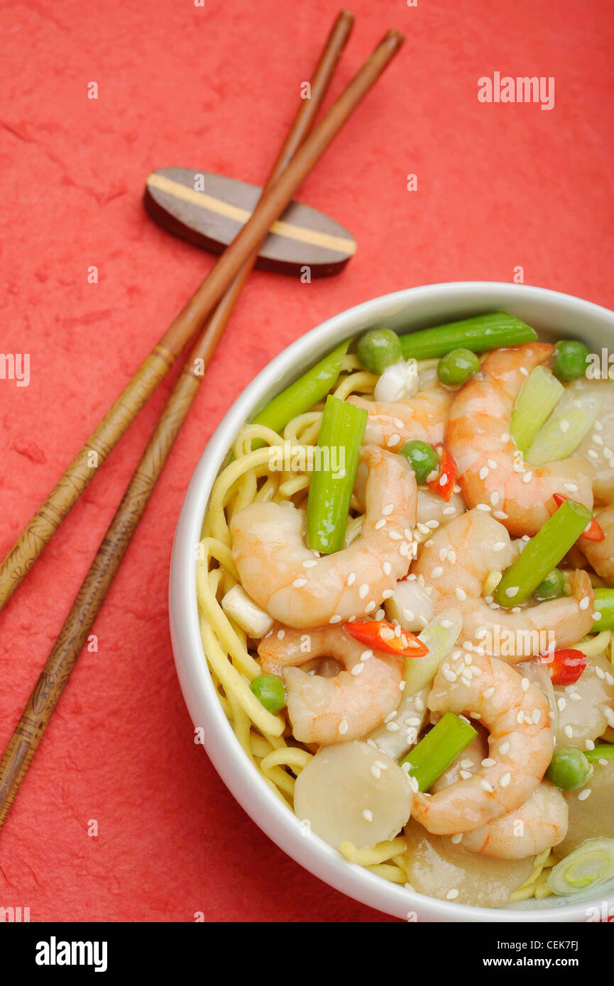 A bowl of stir fried prawns spring onion served egg noodles Prawn and ...
