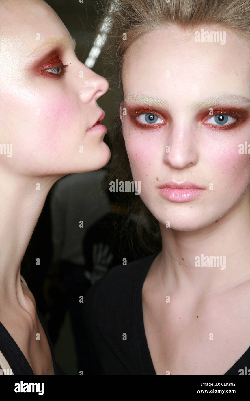 Prada Backstage Milan Ready to Wear Autumn Winter Two models wearing ...