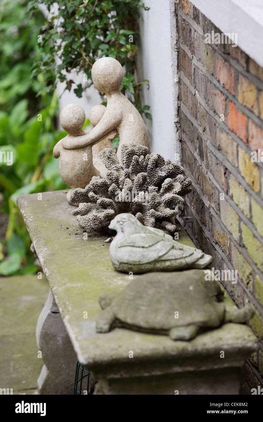 Hidden Treasure Close up image of stone sculptures and coral on stone ...