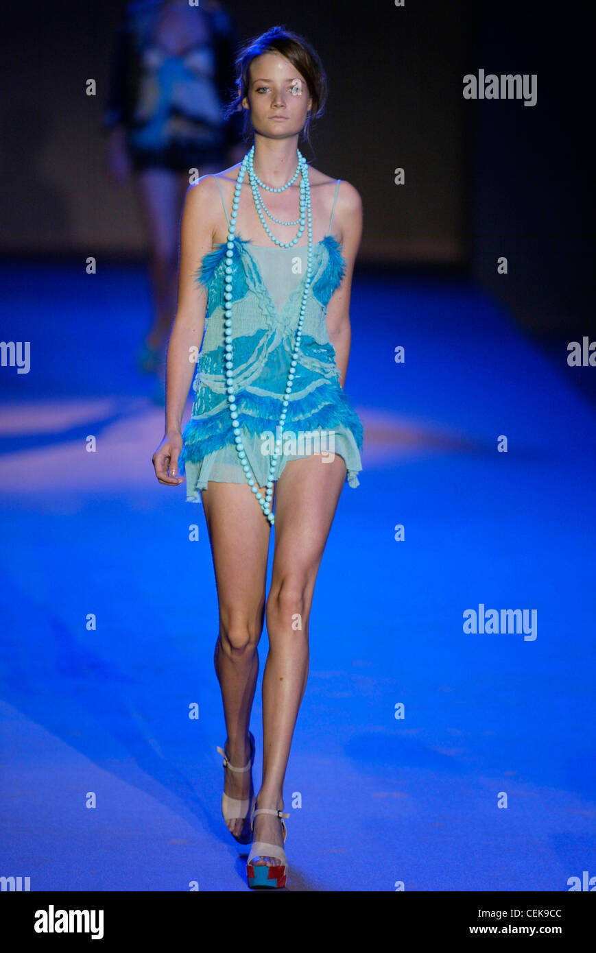 Anna Molinari Milan Spring Summer Model brunette hair off face wearing ...