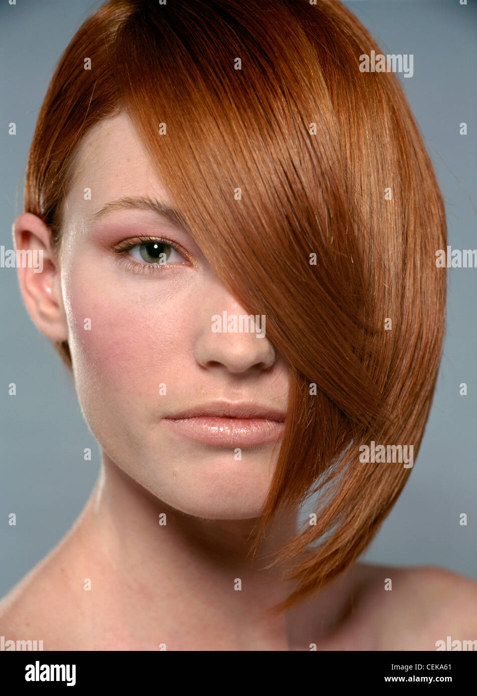 Woman and hair brushed over face hi-res stock photography and images ...