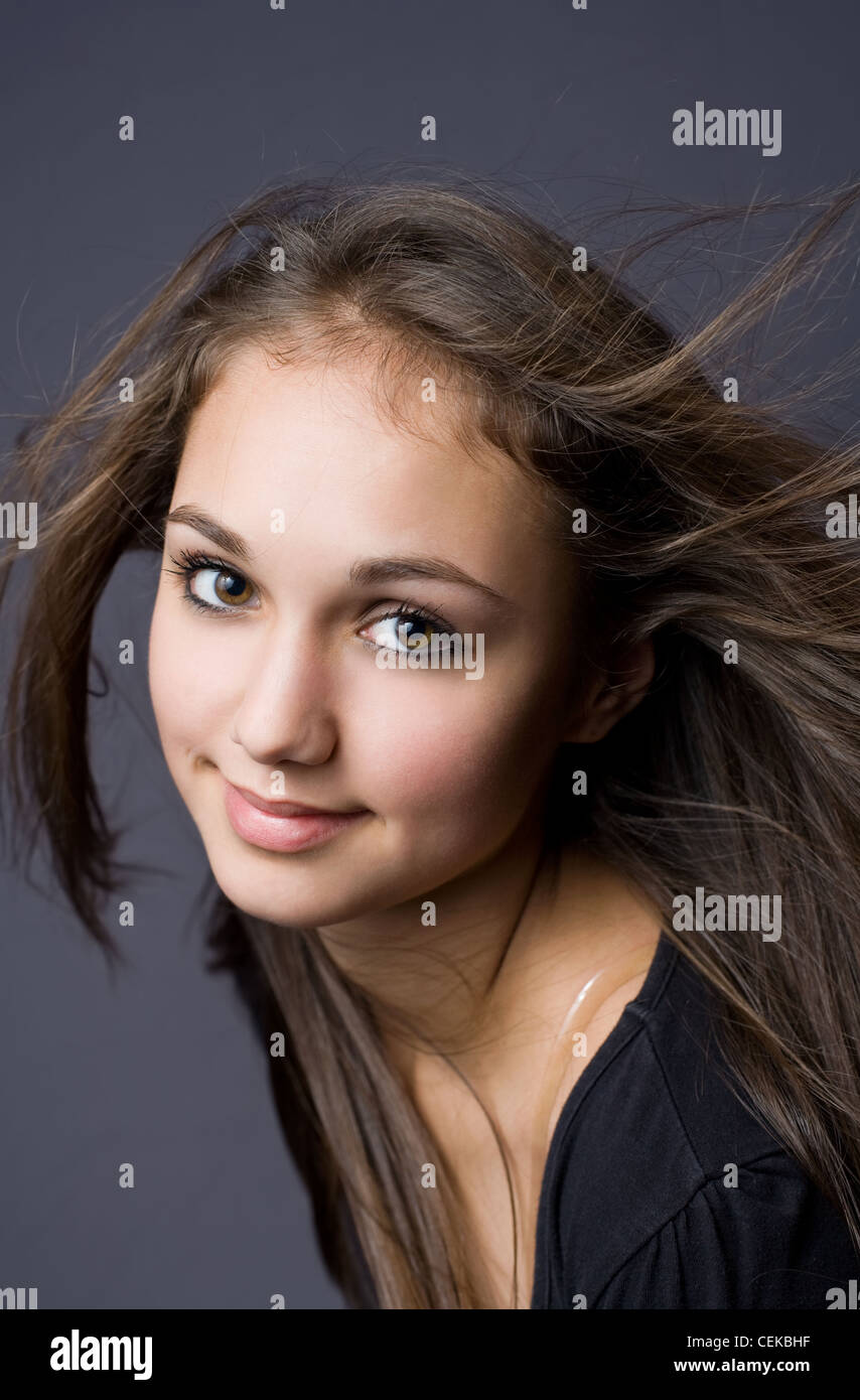 Closeup artistic portrait of gorgeous young brunette Stock Photo - Alamy