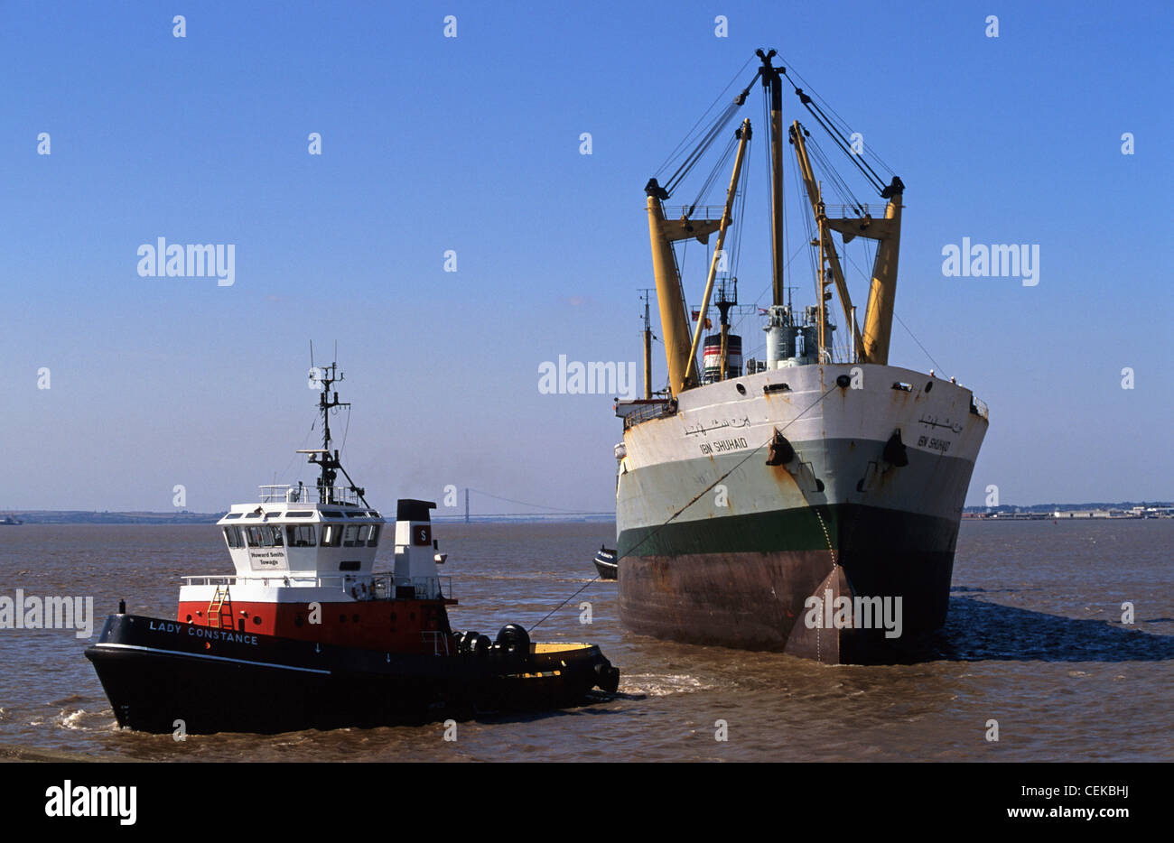 tug boats towing freighter into the port of hull from the humber ...