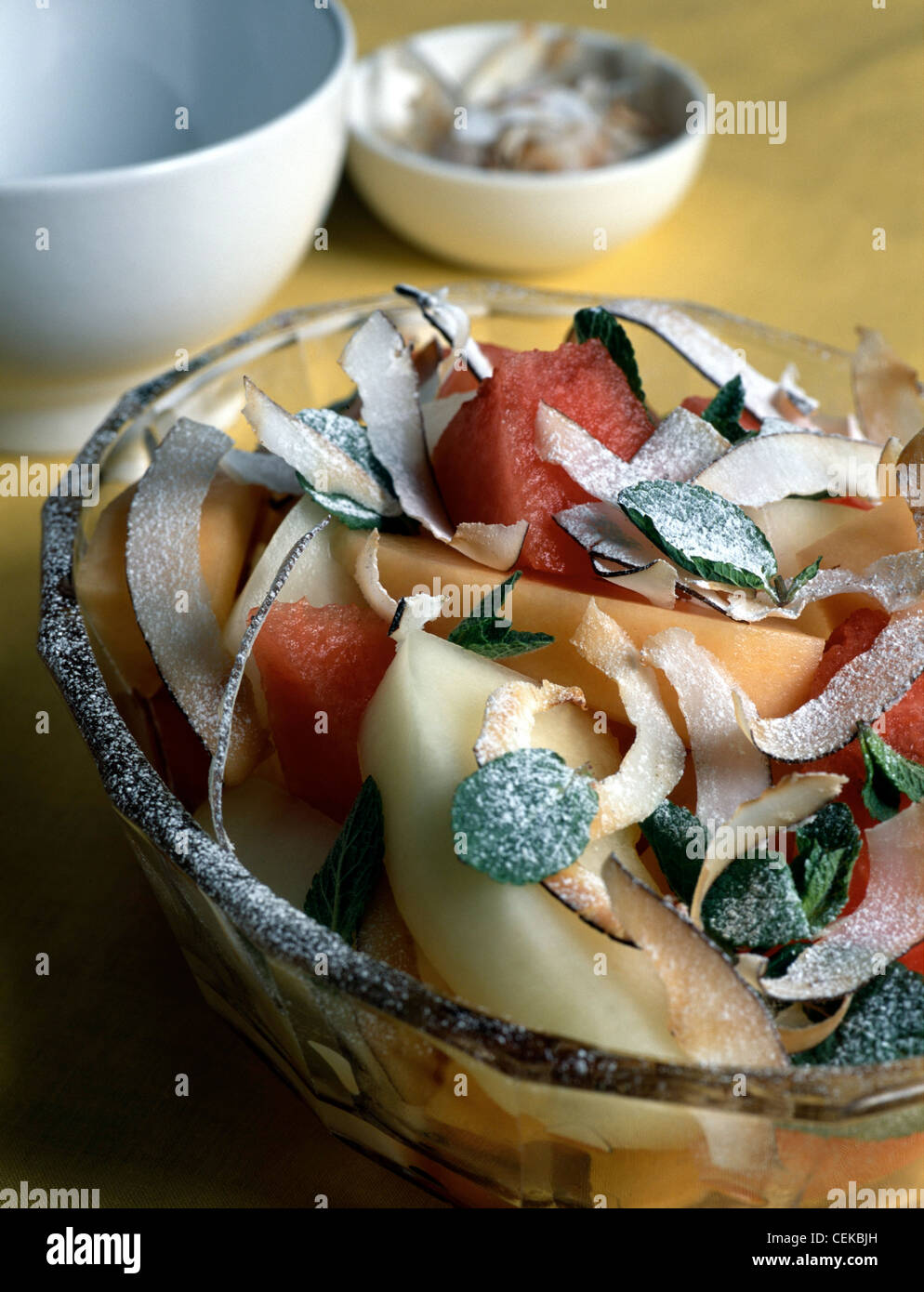 Melon Salad Coconut Bowl of fruit salad containing diced honeydew melon ...
