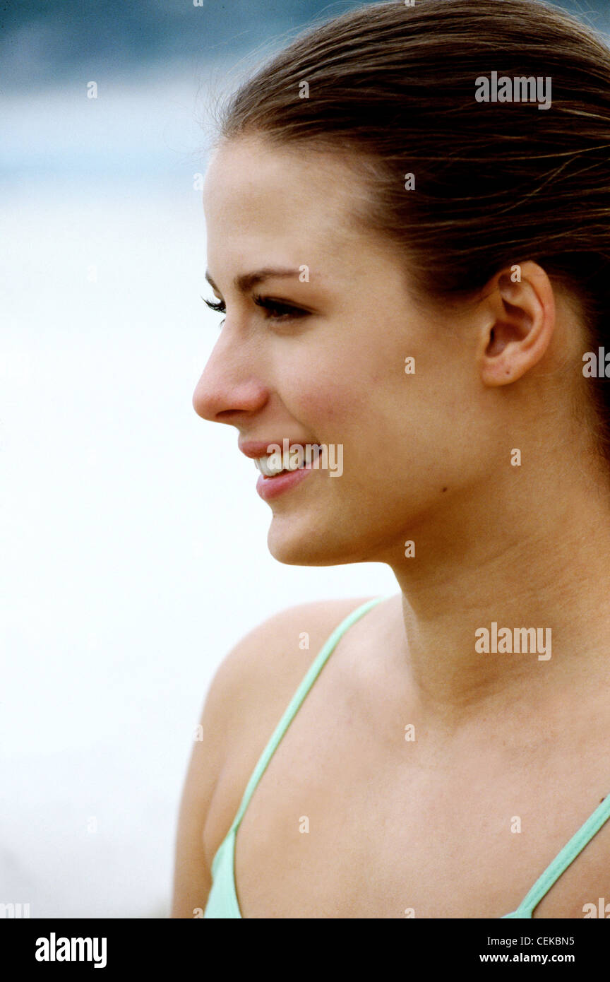 Profile brunette female facing sideways hi-res stock photography and ...