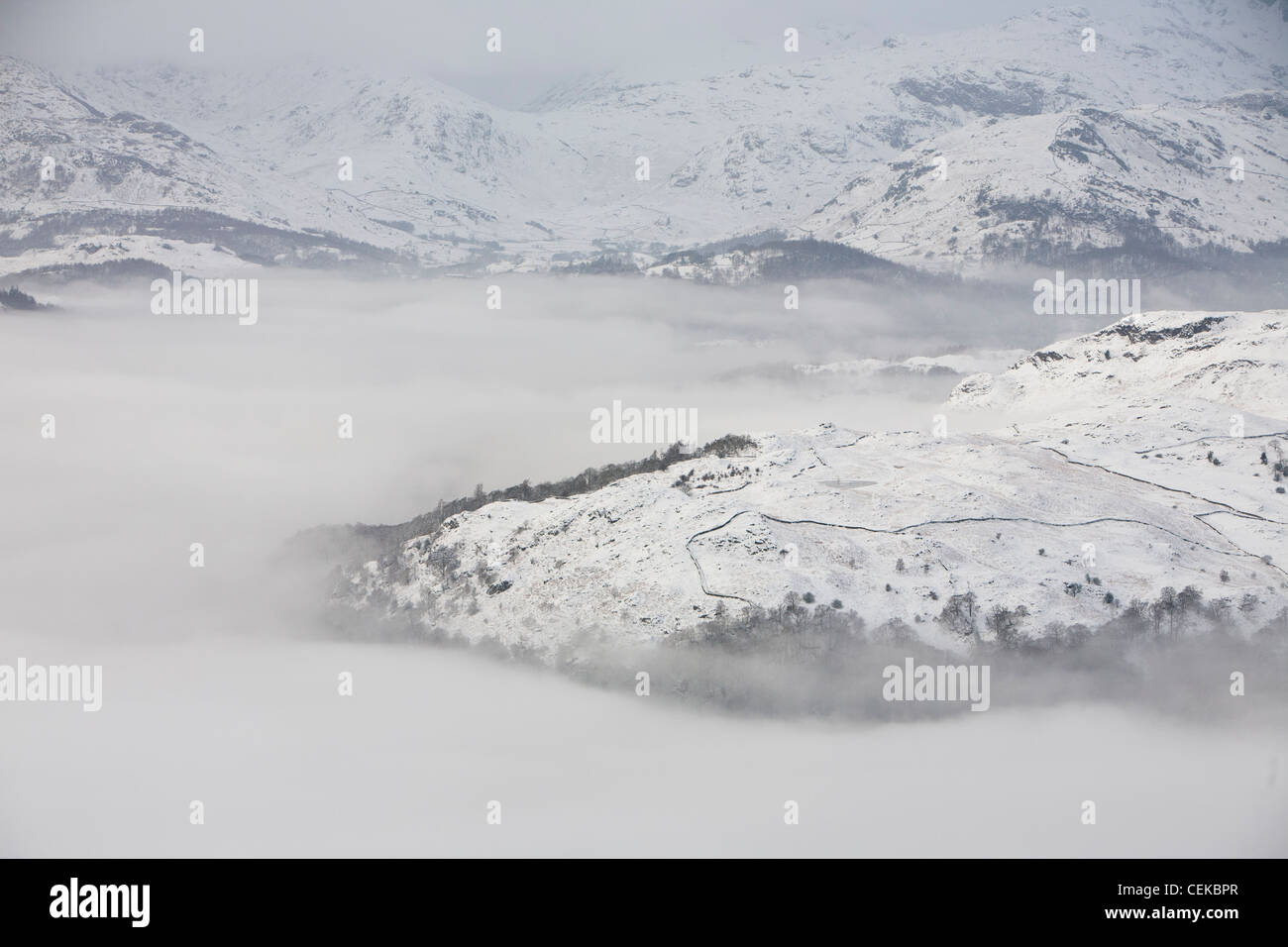 Snow and valley mist over Ambleside in the Lake District, looking ...