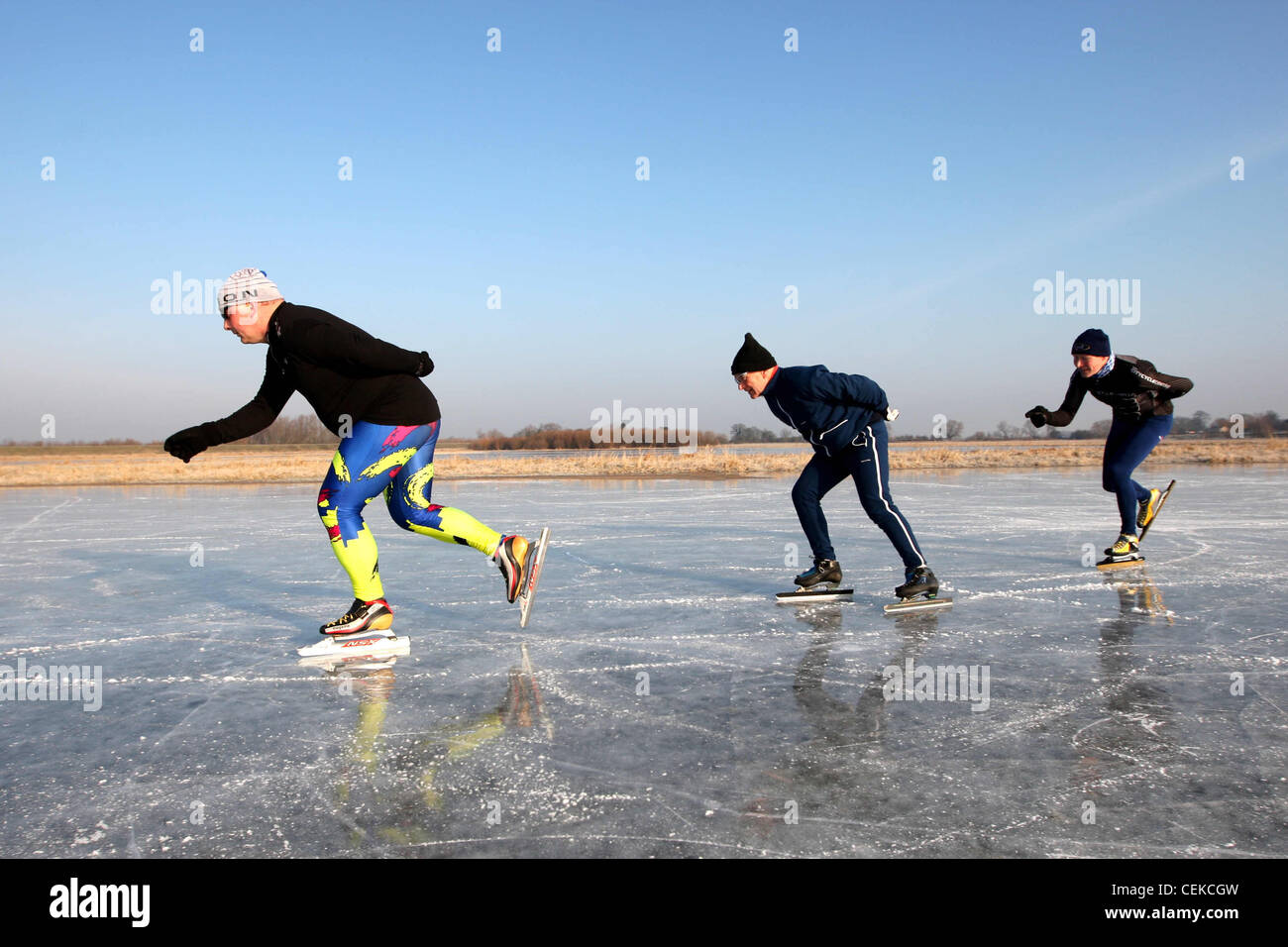 PEOPLE SKATING ON THE FROZEN FENS AT SUTTON GAULT,CAMBRIDGESHIRE Stock ...