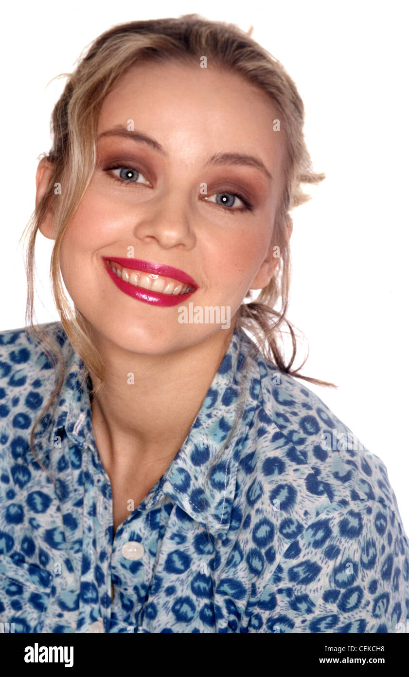 Female long blonde hair off face wearing brown eye shadow and pink ...