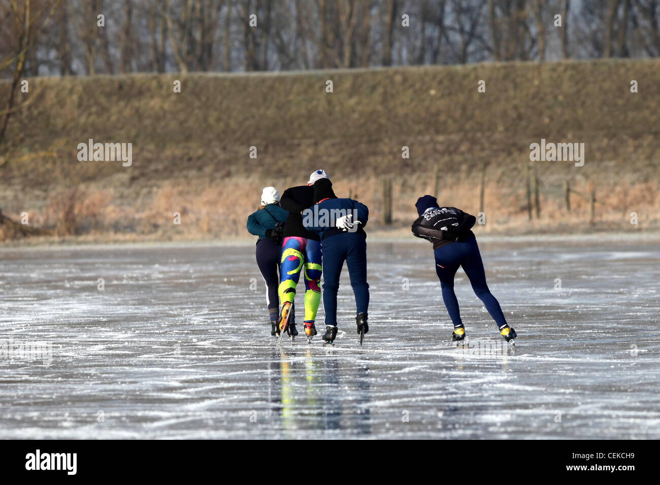 PEOPLE SKATING ON THE FROZEN FENS AT SUTTON GAULT,CAMBRIDGESHIRE Stock ...