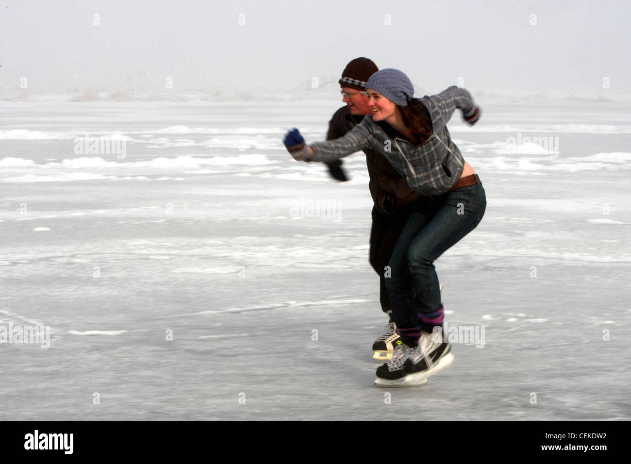PEOPLE SKATING ON THE FROZEN FENS AT SUTTON GAULT,CAMBRIDGESHIRE Stock ...