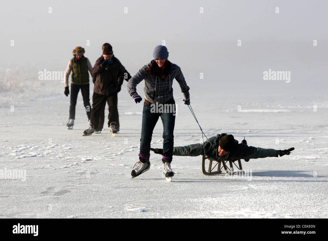 PEOPLE SKATING ON THE FROZEN FENS AT SUTTON GAULT,CAMBRIDGESHIRE Stock ...