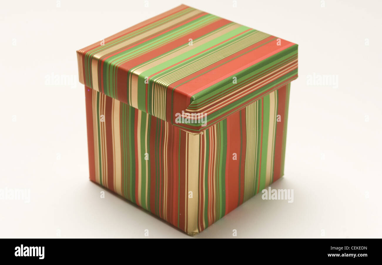 Striped green, gold and pink Gift Box, pictured on plain white ...