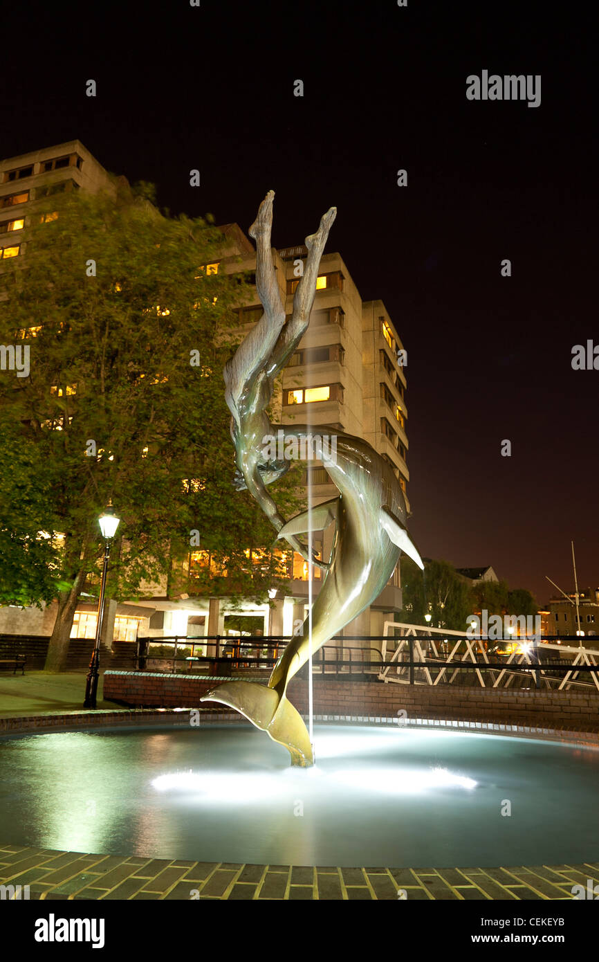 statue of dolphin and child in the fountain near tower bridge London ...