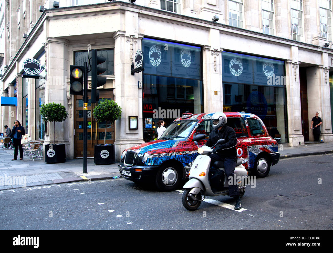 Union Jack Taxi cab in london street Stock Photo - Alamy