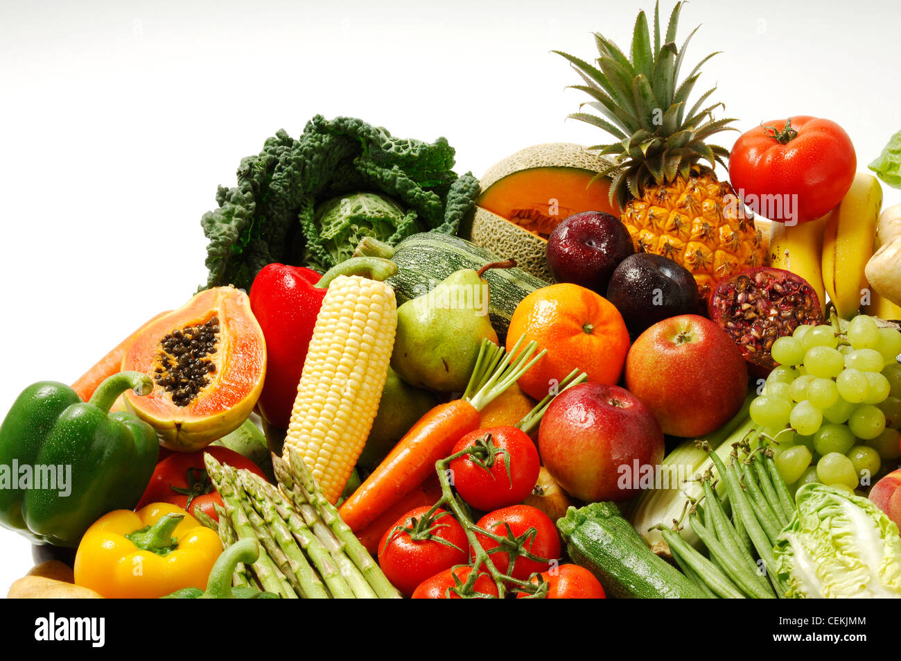 Large selection of fruit and vegetables including grapes, oranges ...