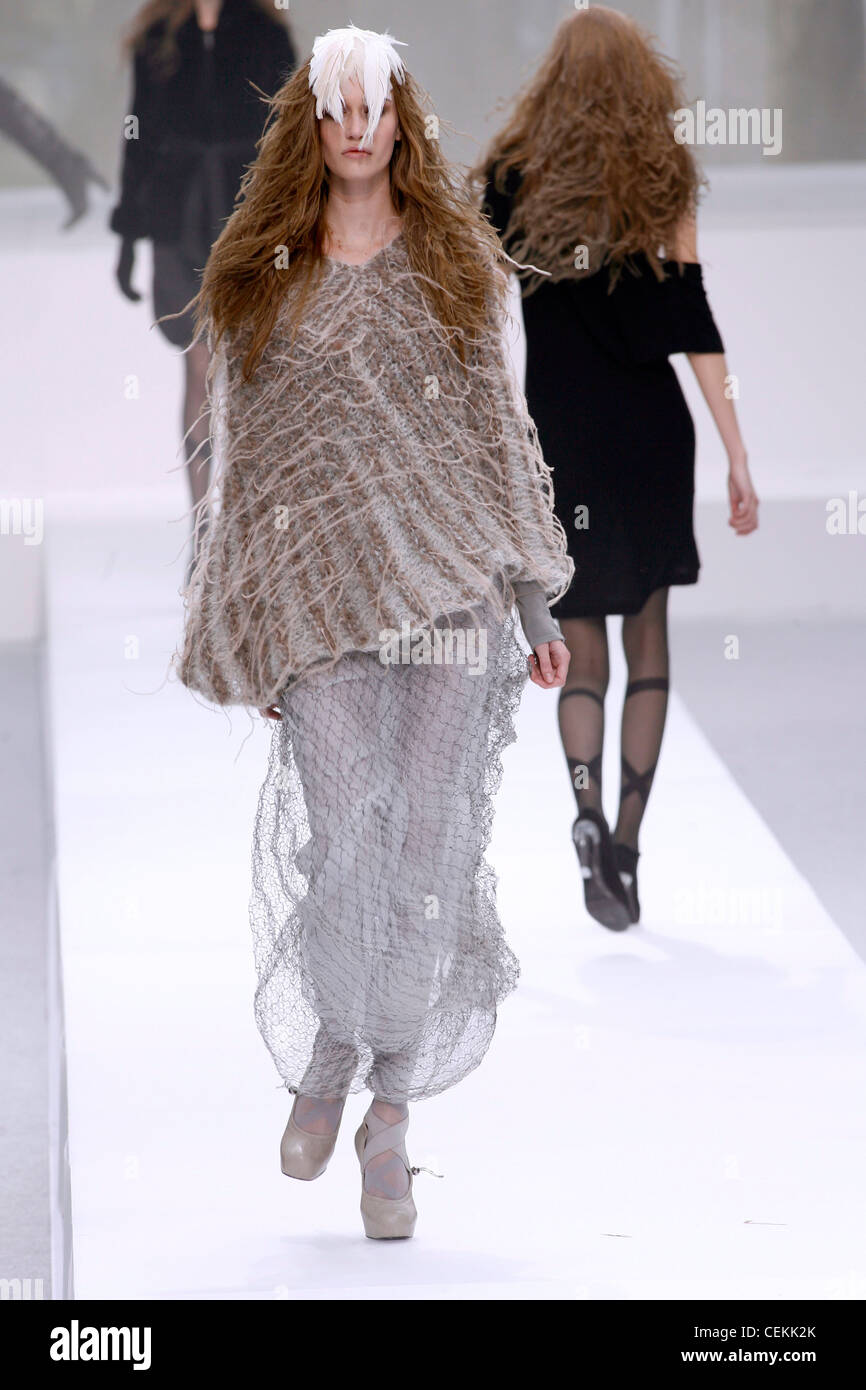 Nina Ricci Paris Ready to Wear Autumn Winter Model wearing grey long ...