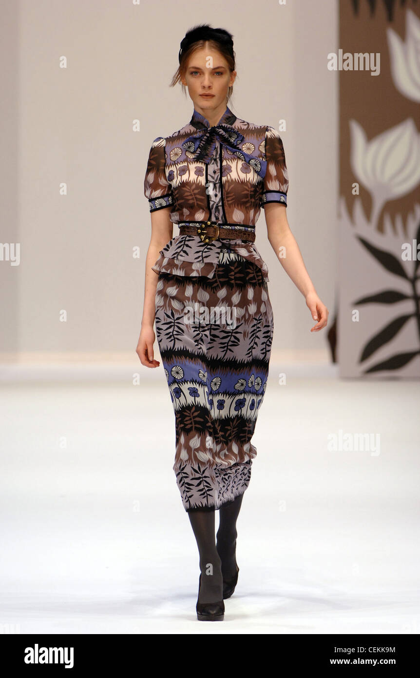 Cacharel Ready to Wear Paris A W Brunette female model wearing a ...
