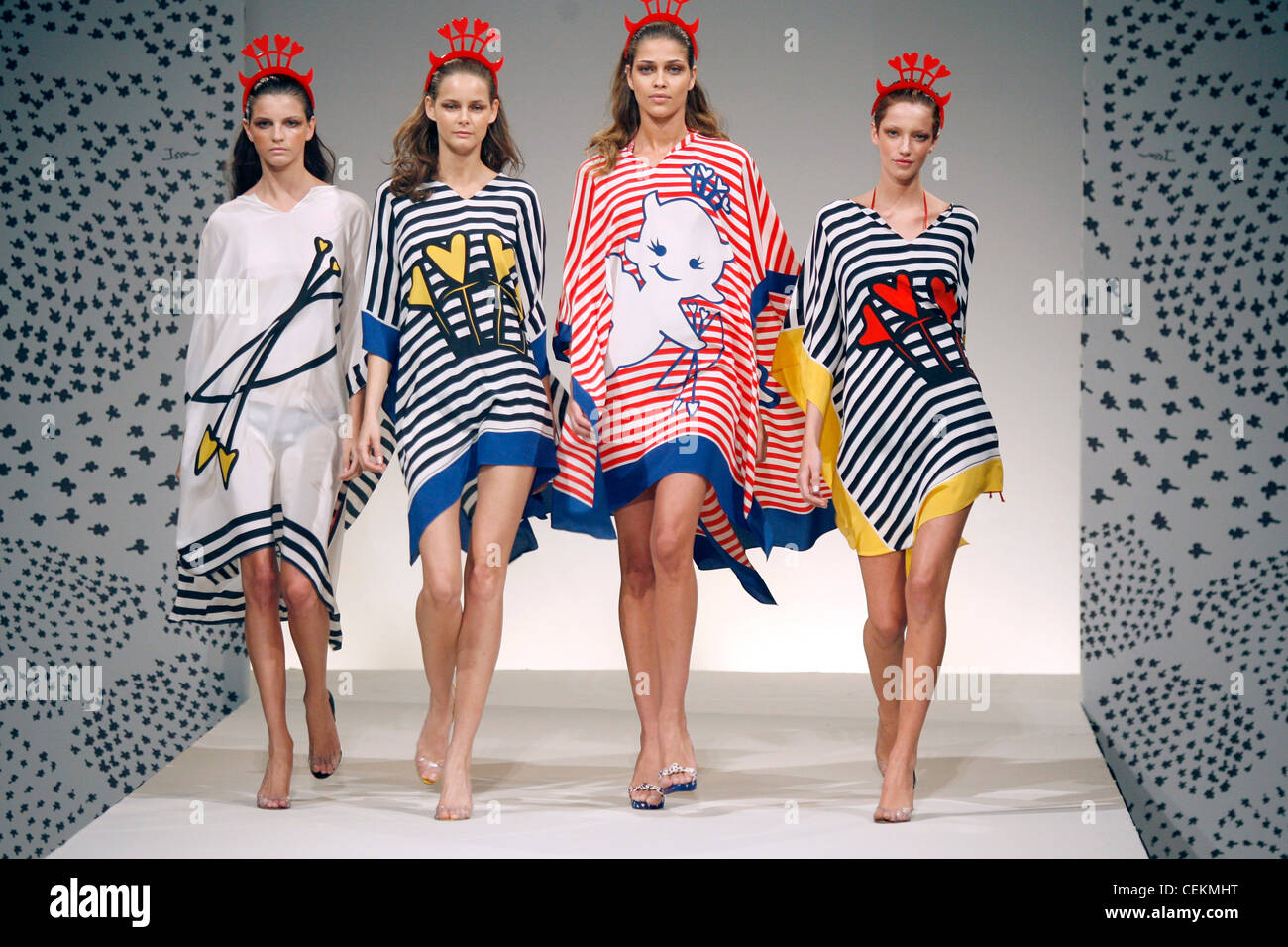 Issa London Ready to Wear Spring Summer Four models wearing red devil ...