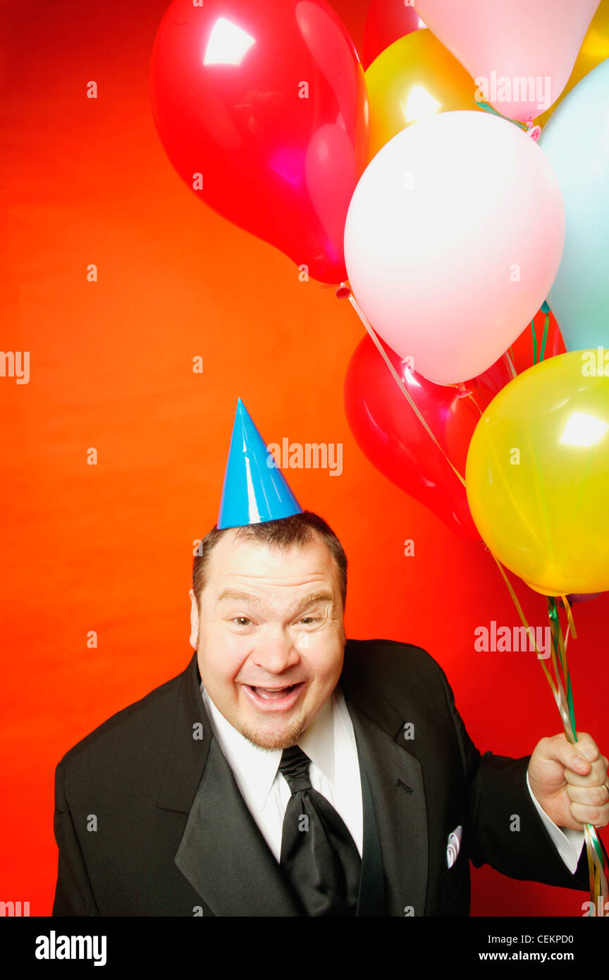 Man With Balloons Stock Photo - Alamy