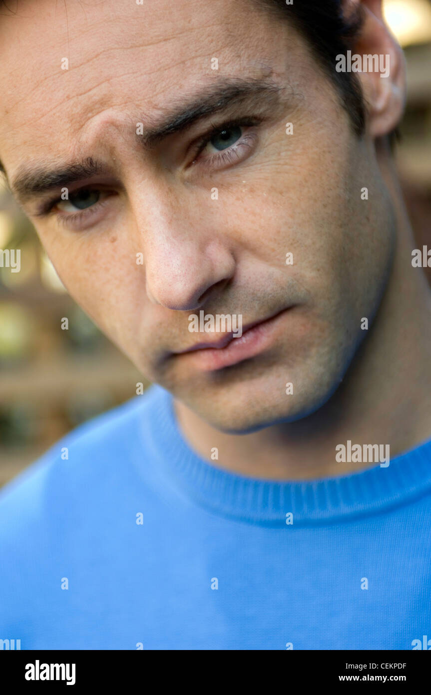 Frowning hi-res stock photography and images - Alamy
