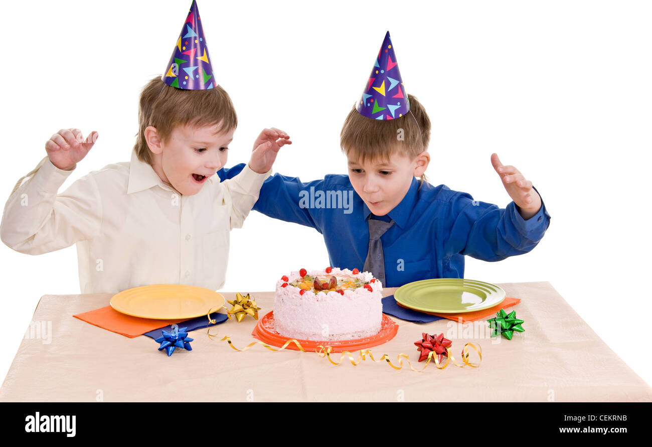 two happy boy with a cake isolated on white background Stock Photo - Alamy