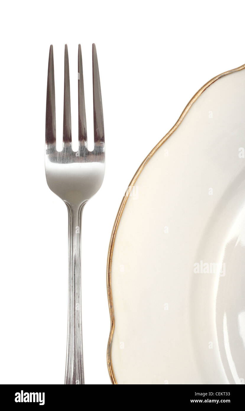 fork and plate, photo on the white background Stock Photo - Alamy