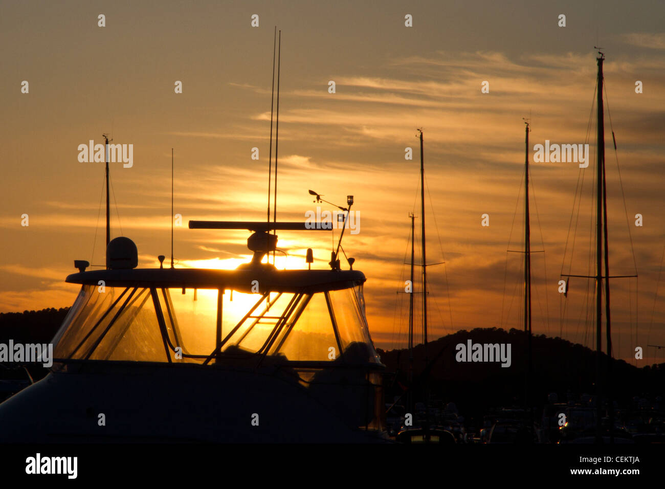 sunset on motor boat radar instruments Stock Photo - Alamy