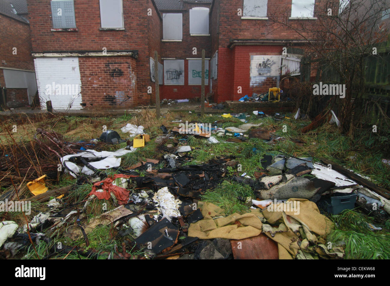 Abandoned houses with rubbished strewn across the gardens Stock Photo ...