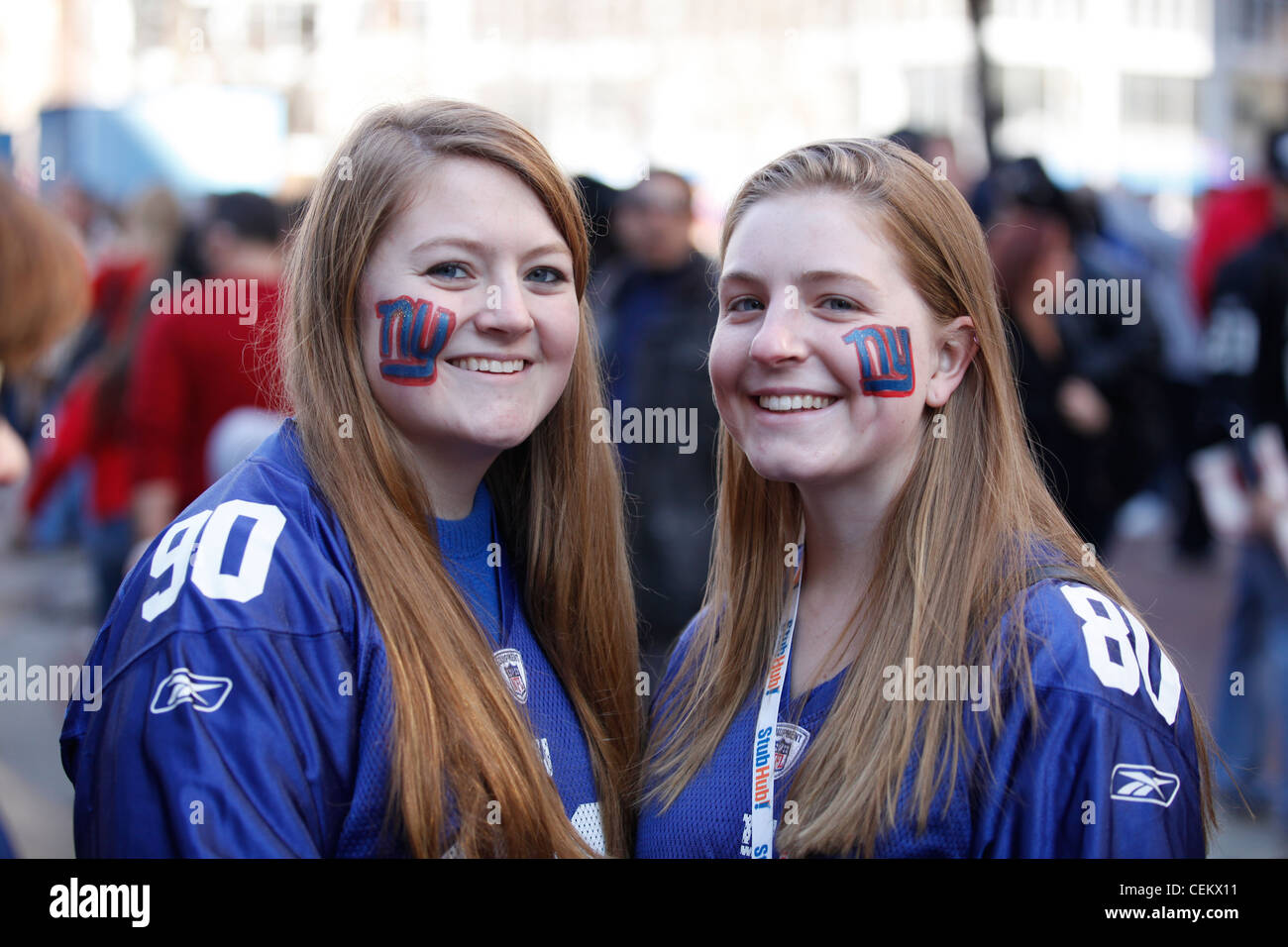 New York Giants fans, young women, with face makeup before Superbowl ...