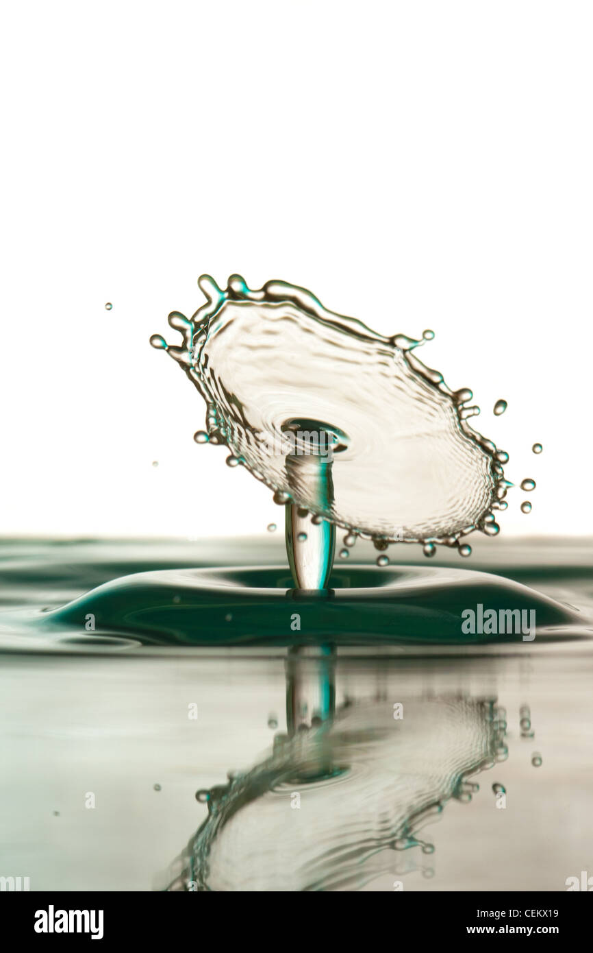 Water drop falling and colliding with another one Stock Photo - Alamy