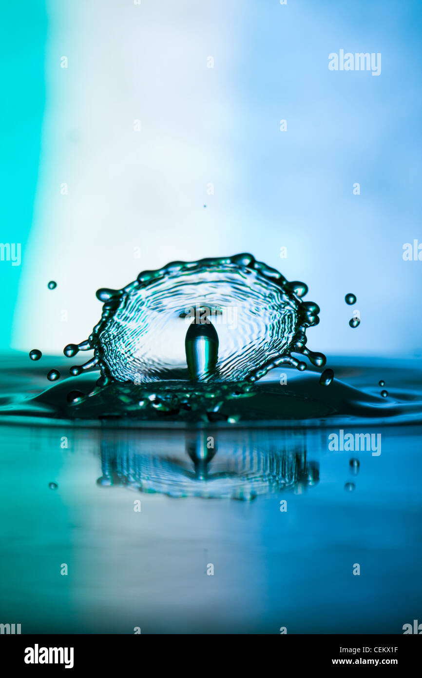 Water drop falling and colliding with another one Stock Photo - Alamy