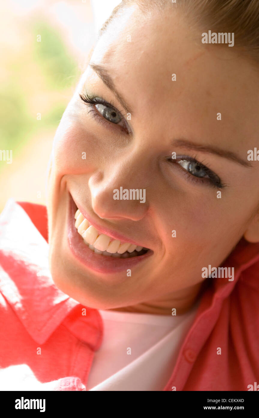 Female smiling to camera Stock Photo - Alamy