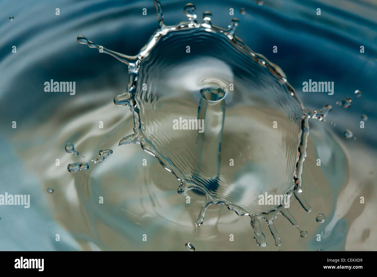 Water drop falling and colliding with another one Stock Photo - Alamy