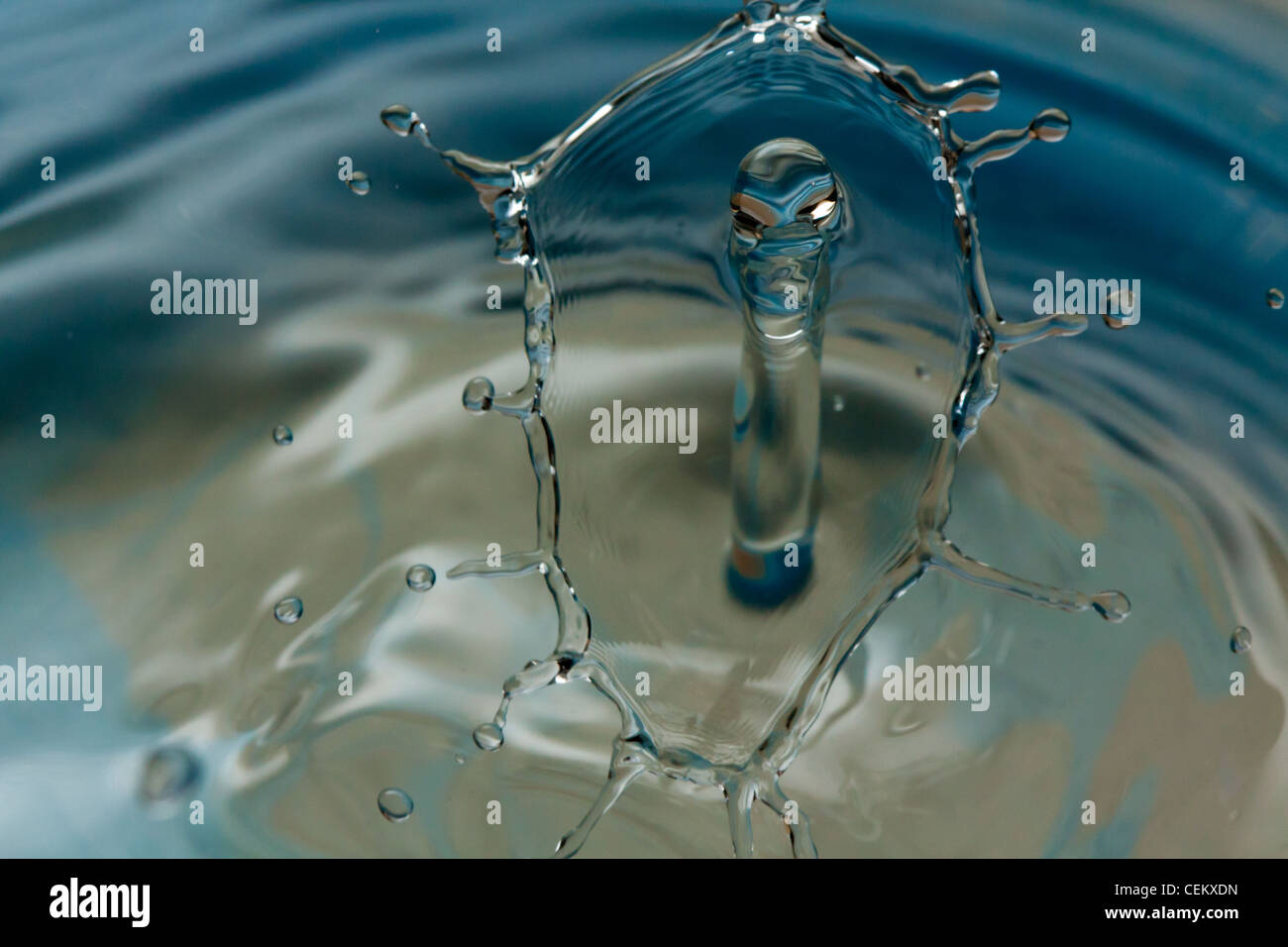 Water drop falling and colliding with another one Stock Photo - Alamy